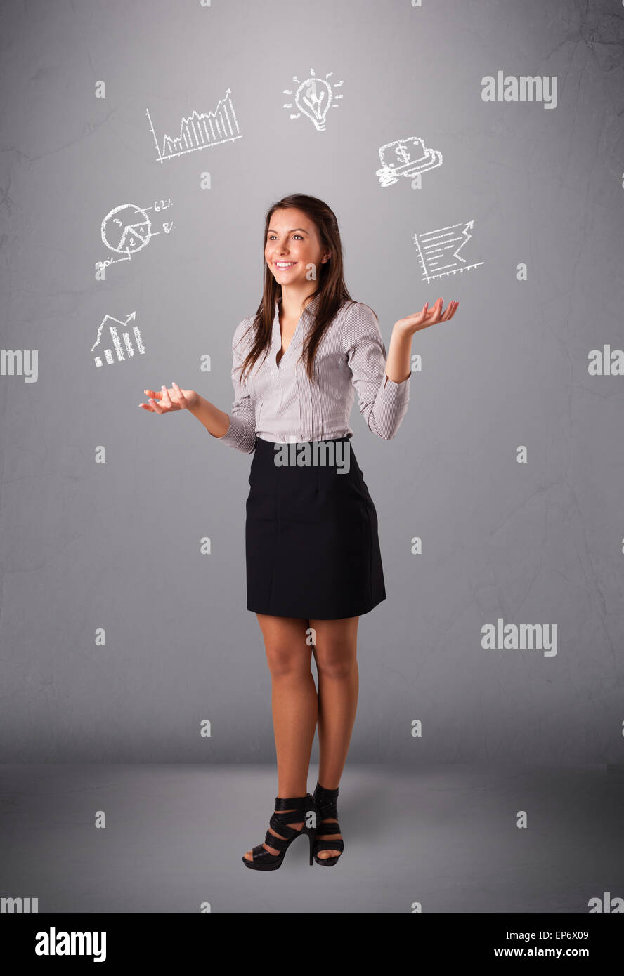 beautiful young woman juggling with statistics and graphs Stock Photo ...