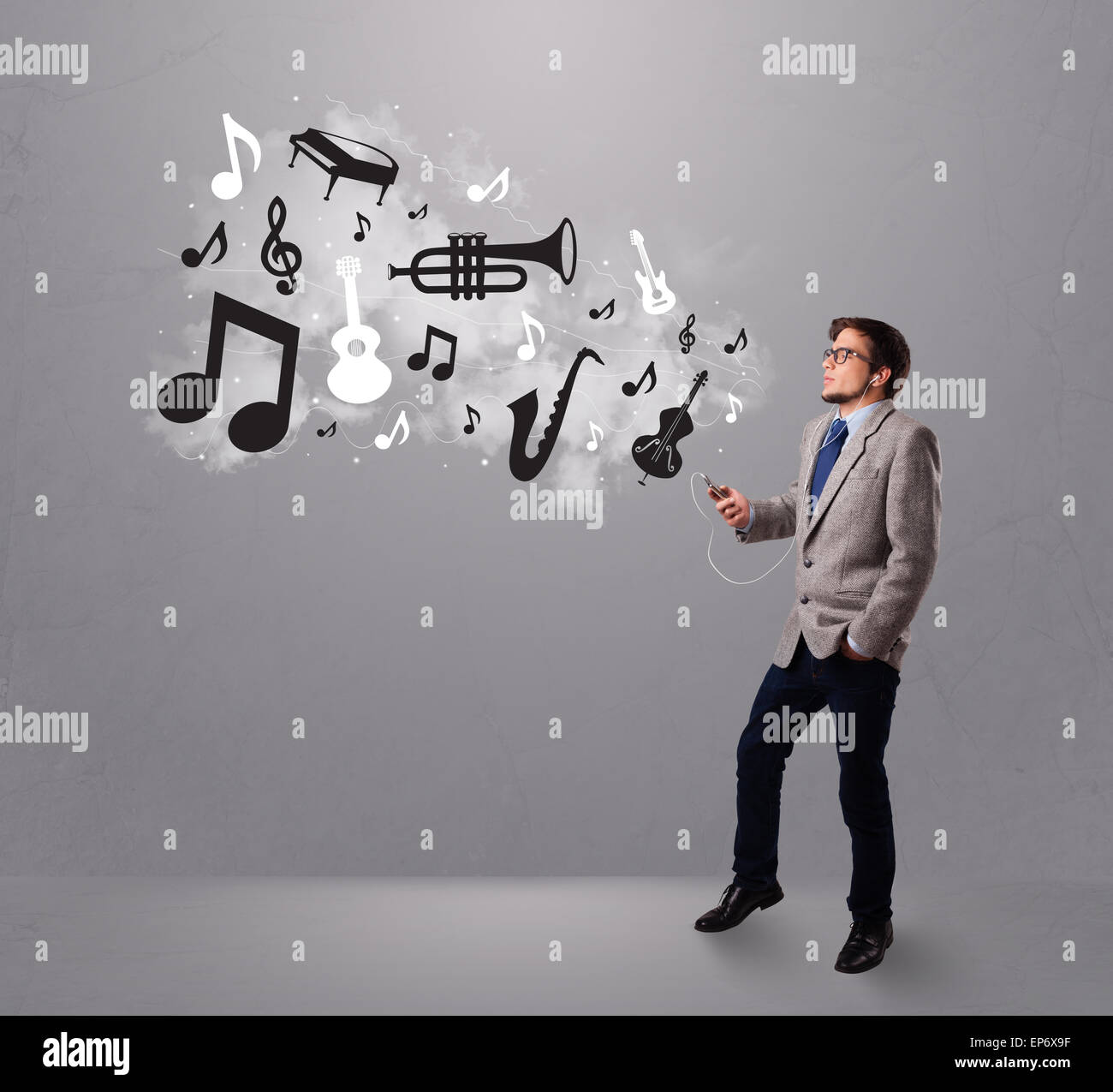 attractive young man singing and listening to music with musical notes ...