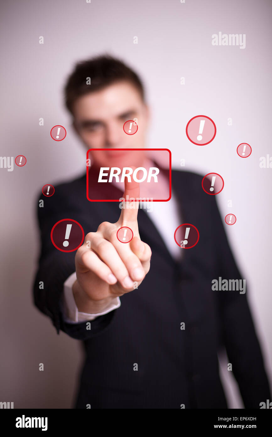 pressing error button with one hand Stock Photo - Alamy