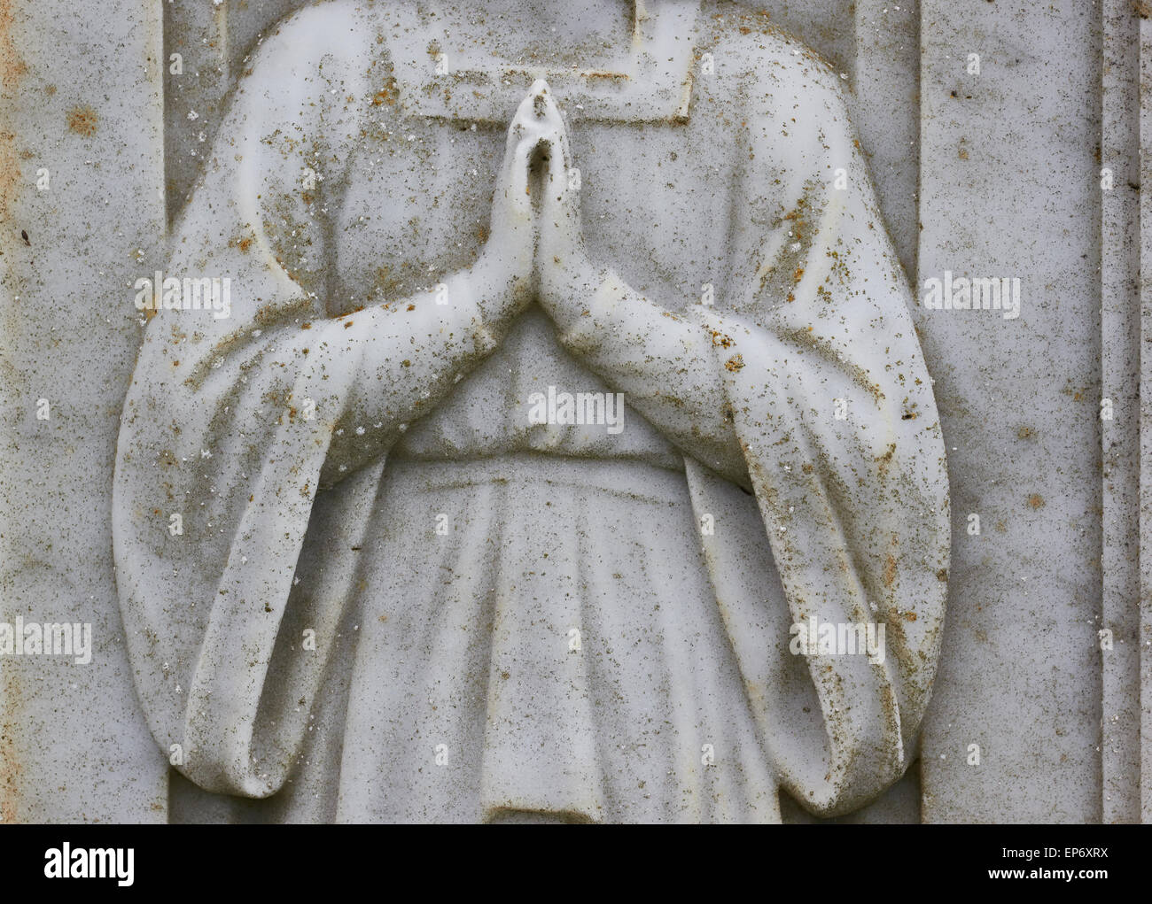 Robed female figure with hands clasped in prayer on a grave in Barnoon ...