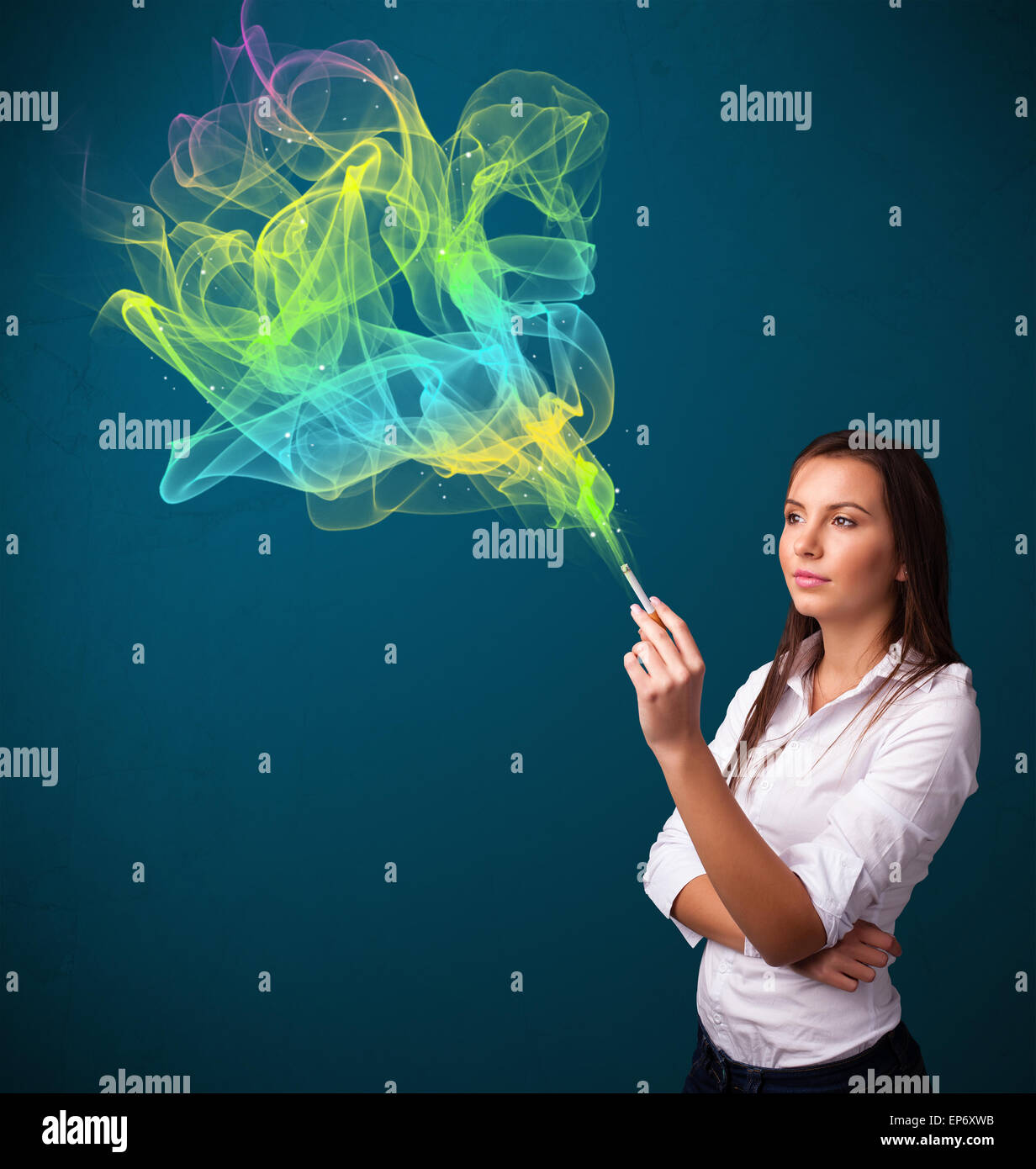 Pretty lady smoking cigarette with colorful smoke Stock Photo - Alamy