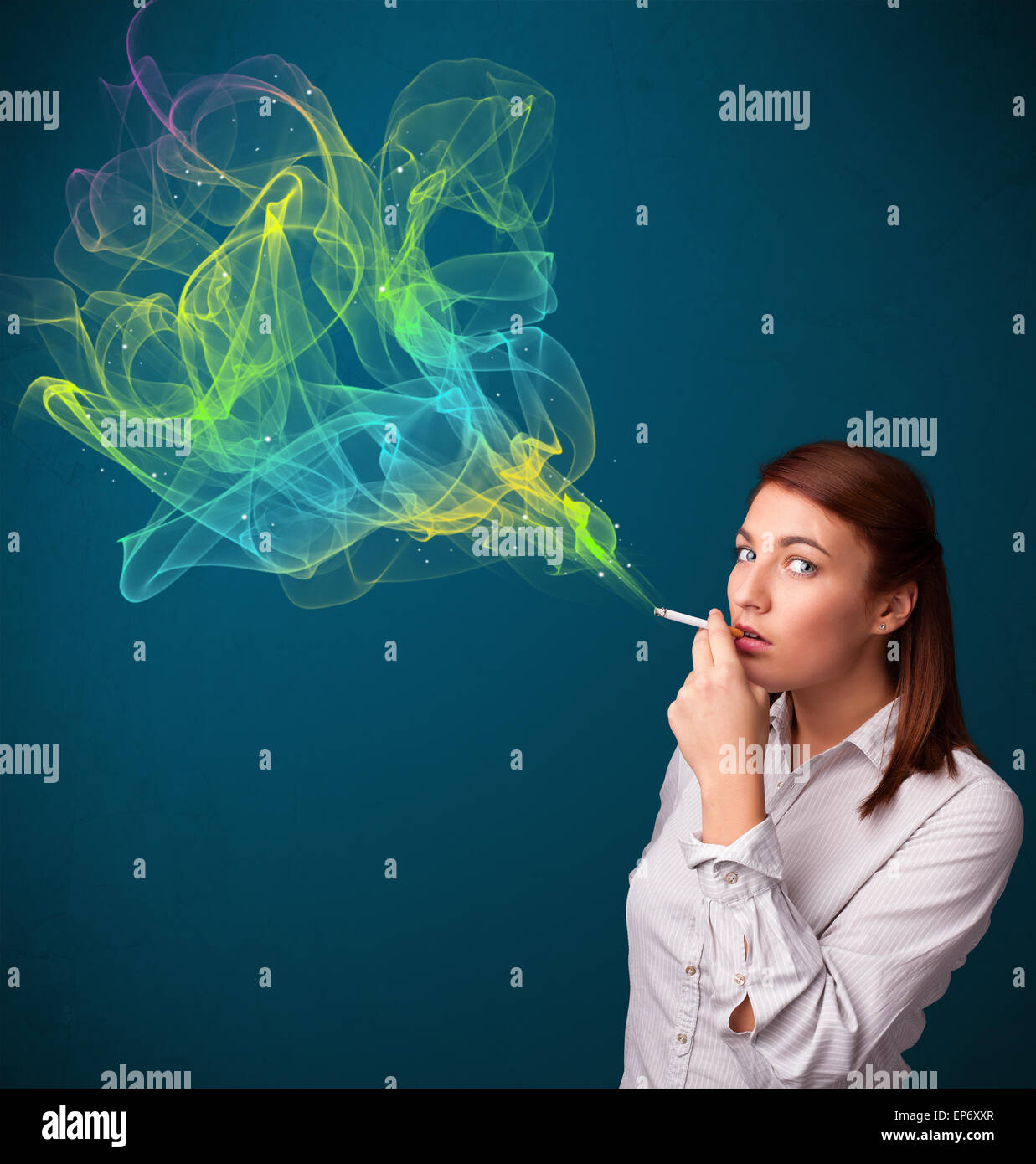 Pretty lady smoking cigarette with colorful smoke Stock Photo - Alamy