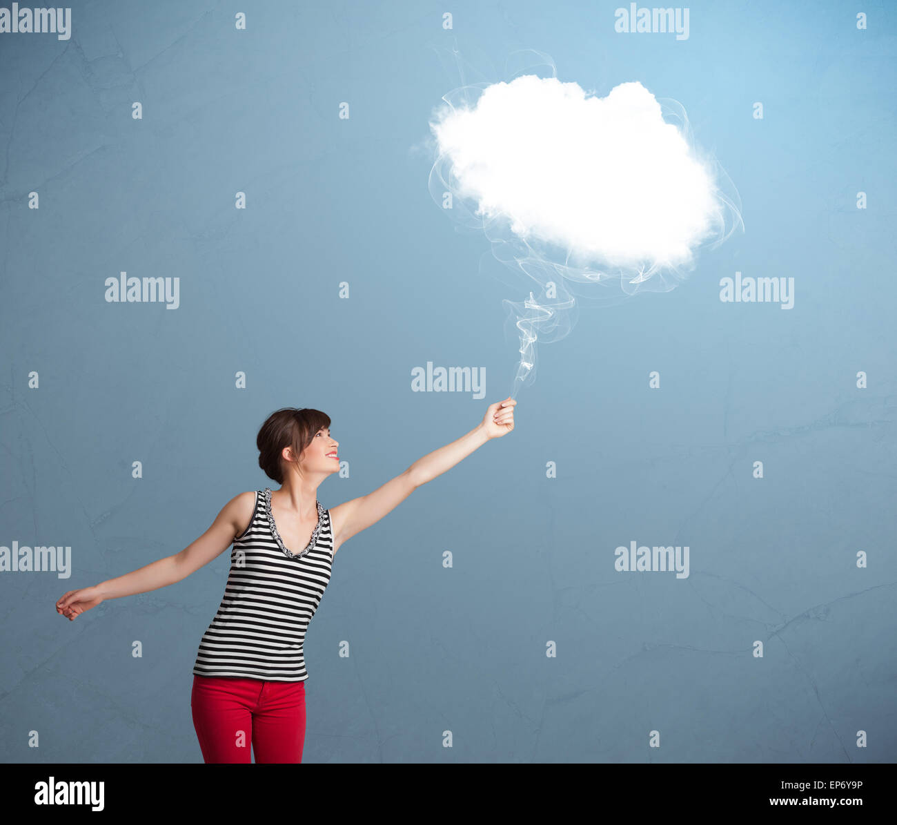 Beautiful lady holding cloud Stock Photo - Alamy