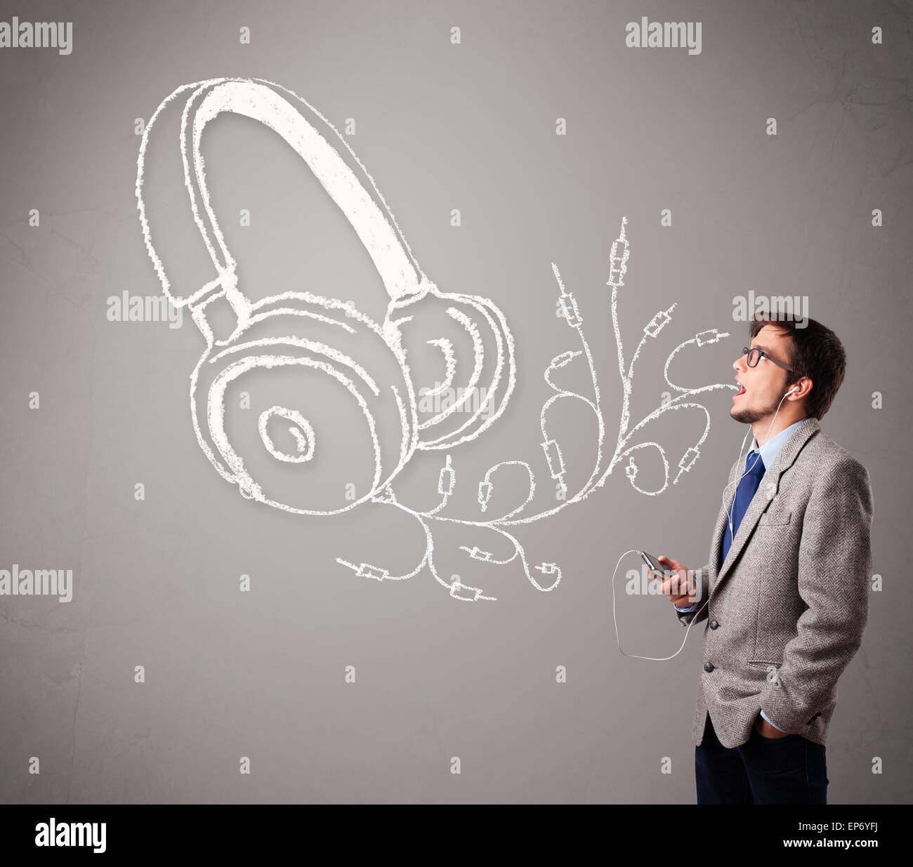 attractive man singing and listening to music with abstract headphone ...
