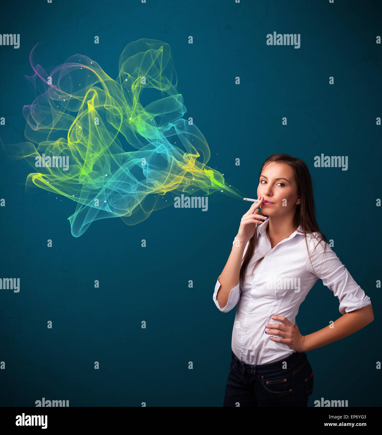 Pretty lady smoking cigarette with colorful smoke Stock Photo - Alamy