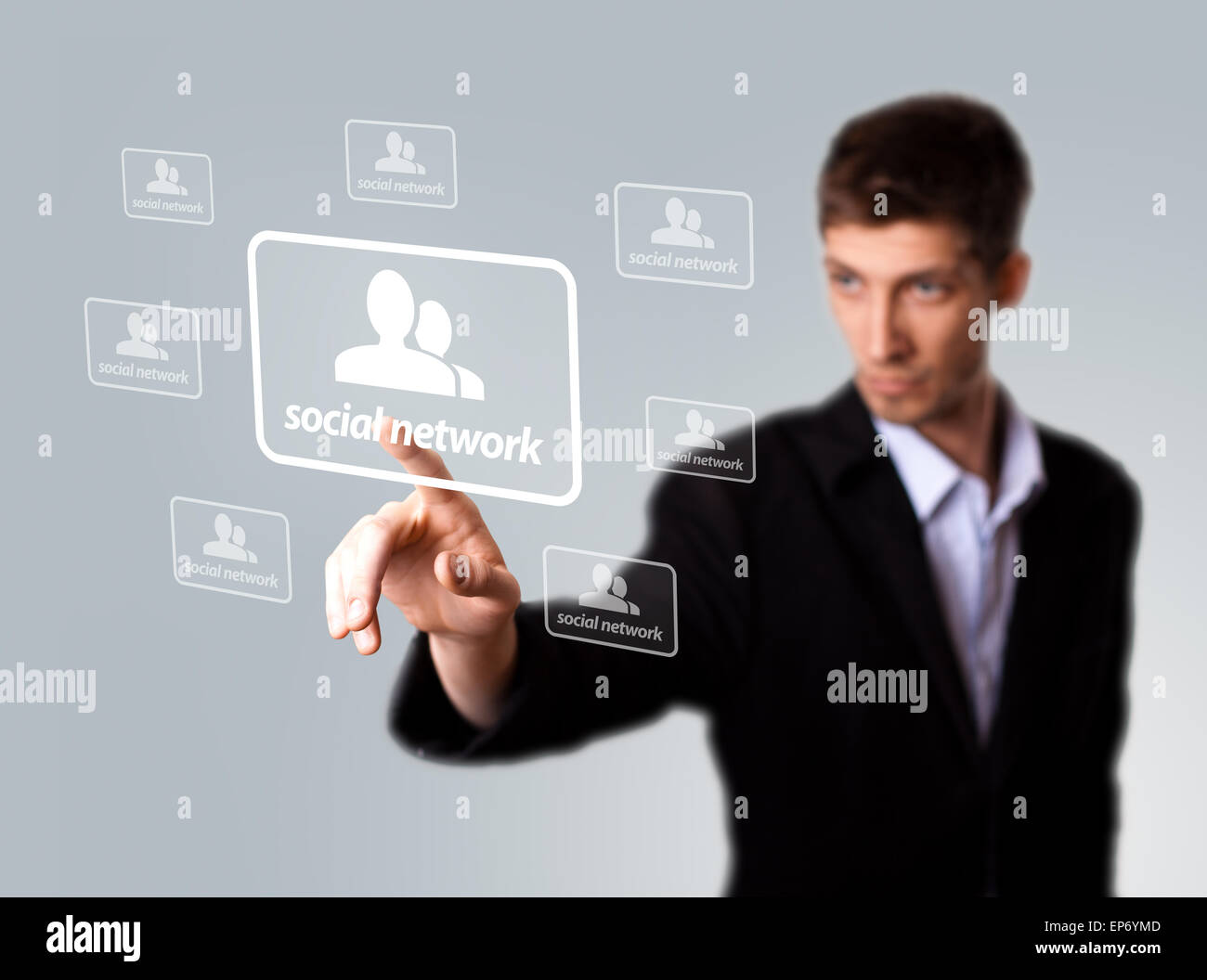 Businessman hand pressing Social network sign Stock Photo - Alamy