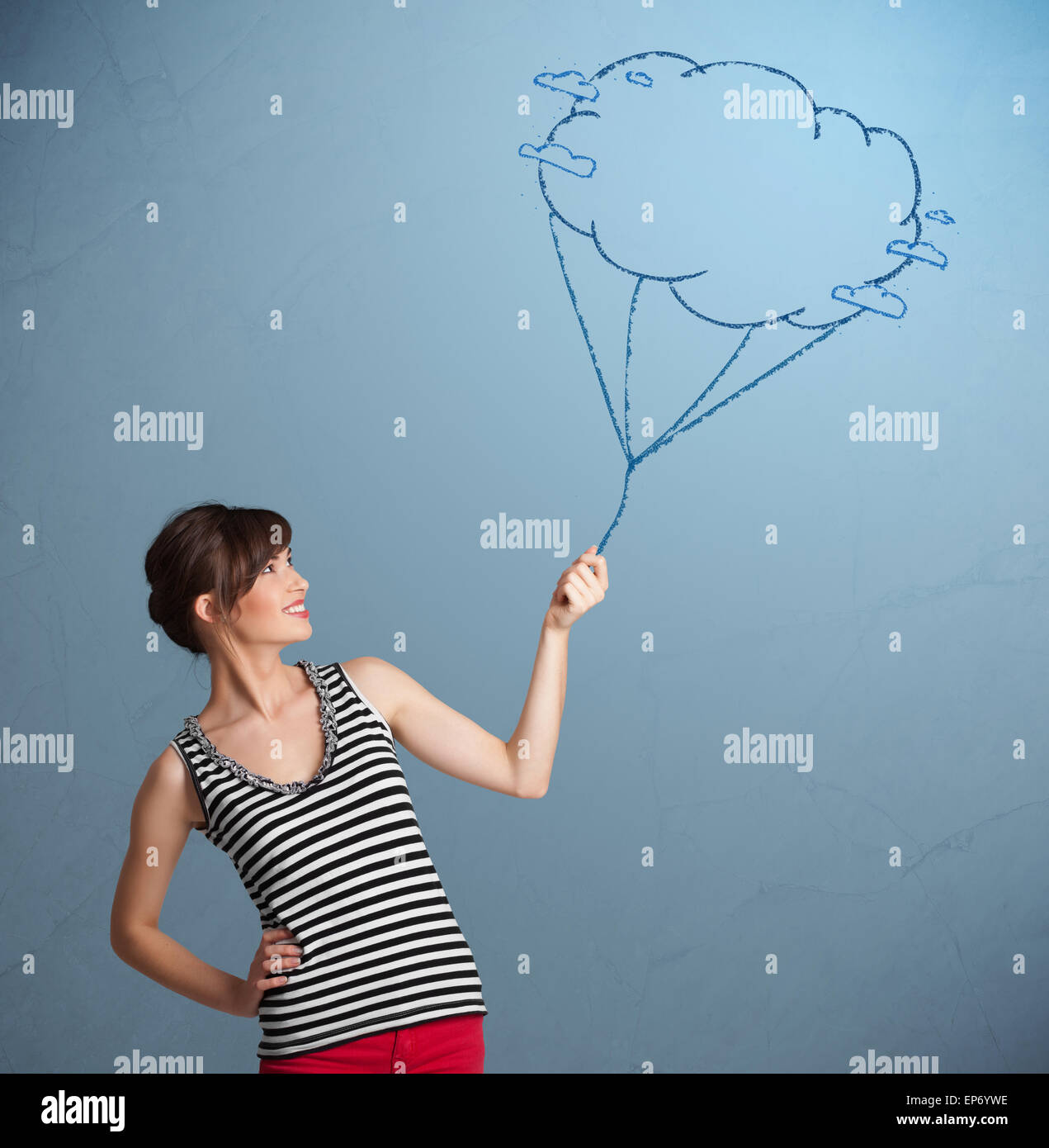 Pretty lady holding a cloud balloon drawing Stock Photo - Alamy