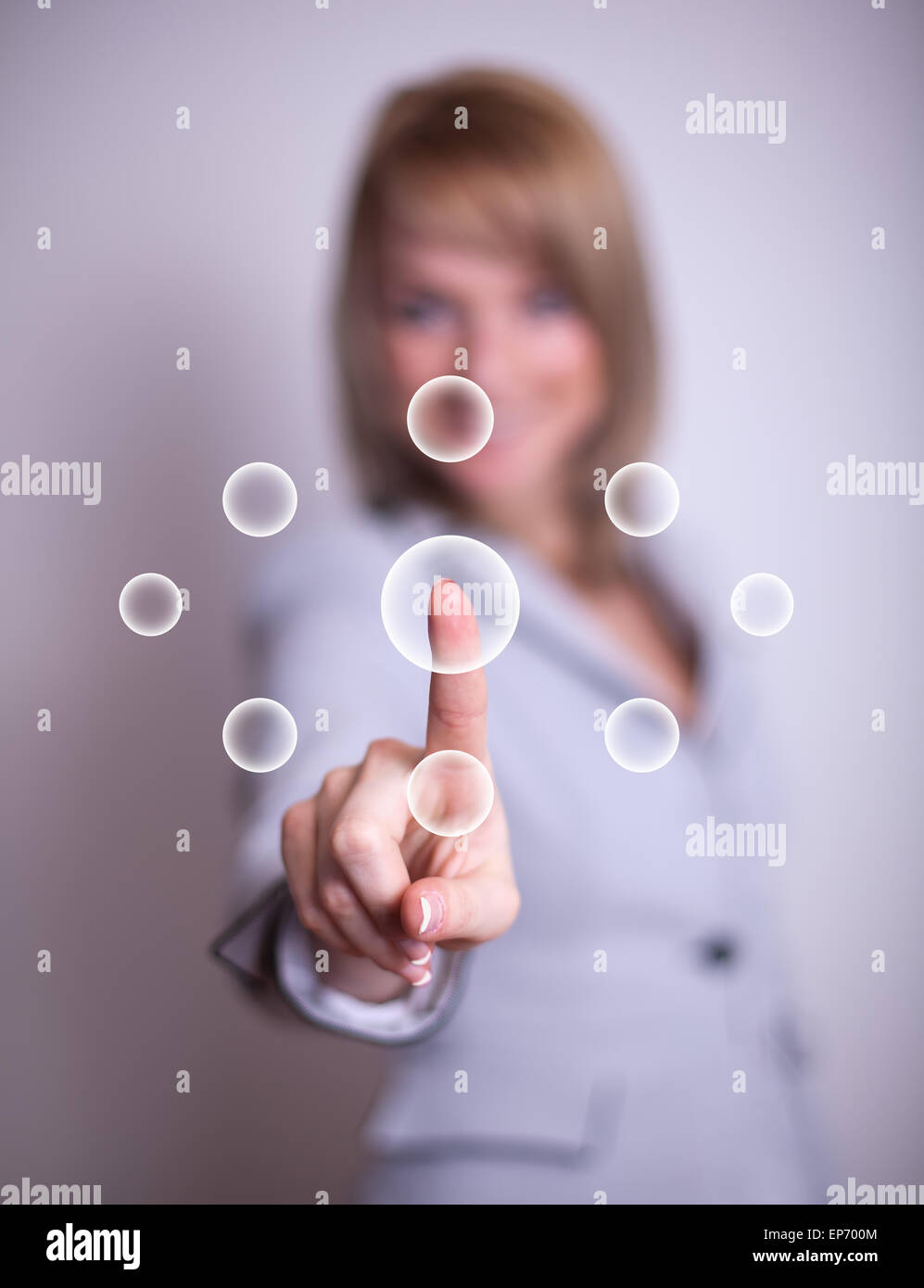 woman pressing digital buttons Stock Photo - Alamy