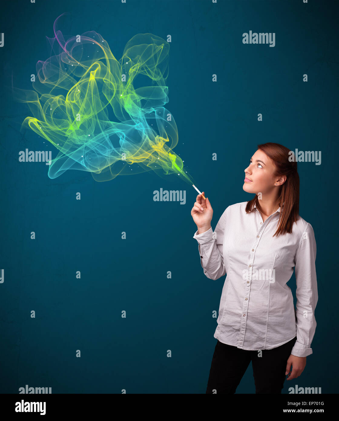 Pretty lady smoking cigarette with colorful smoke Stock Photo - Alamy