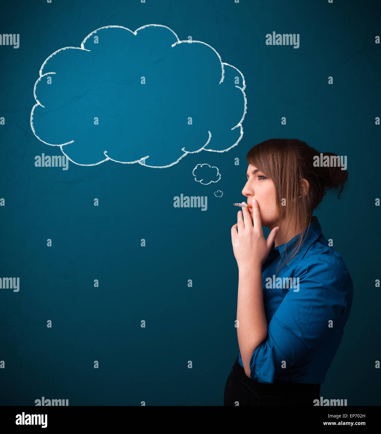 Beautiful lady smoking cigarette with idea cloud Stock Photo - Alamy