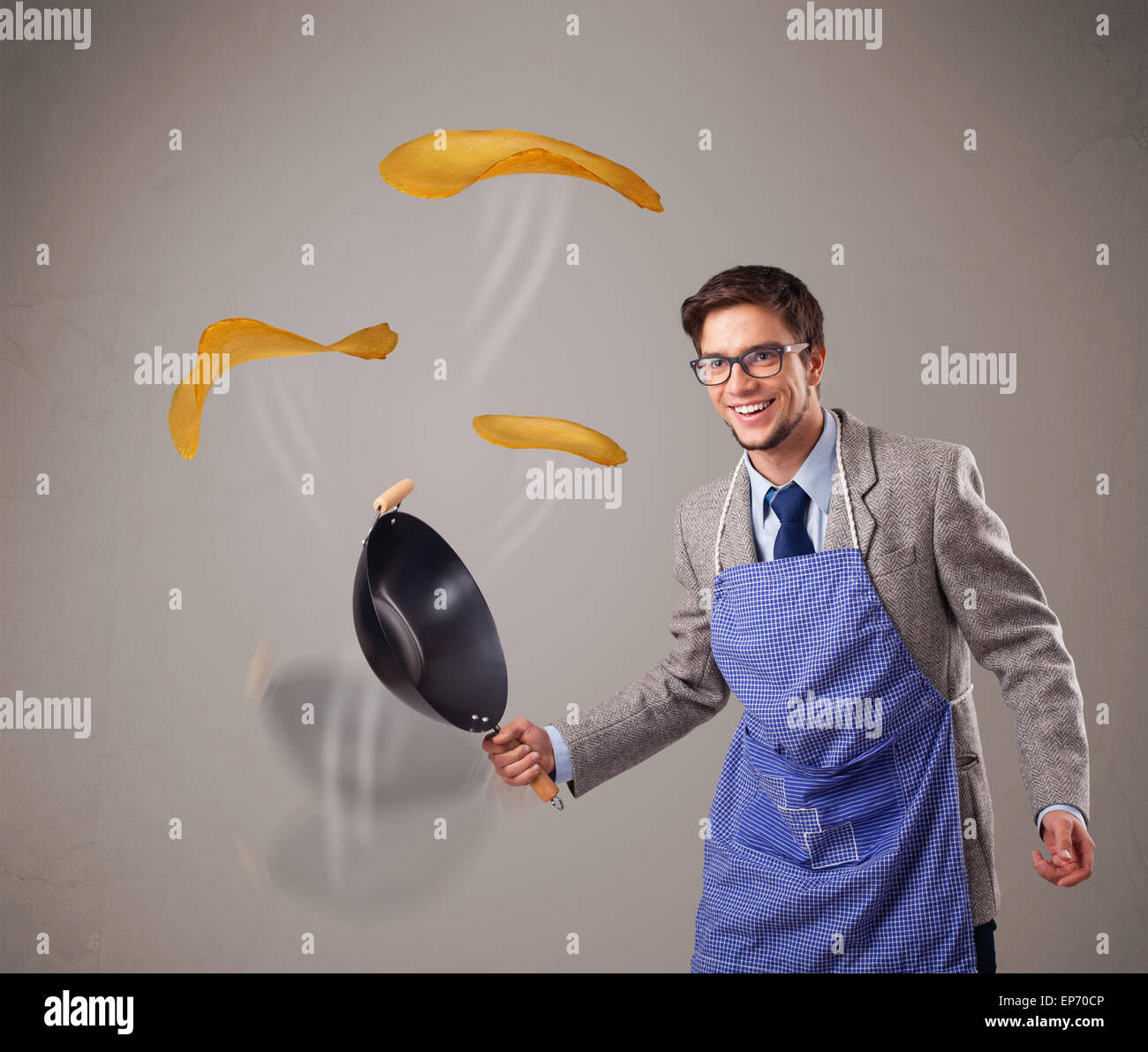 Boy making pancakes Stock Photo - Alamy