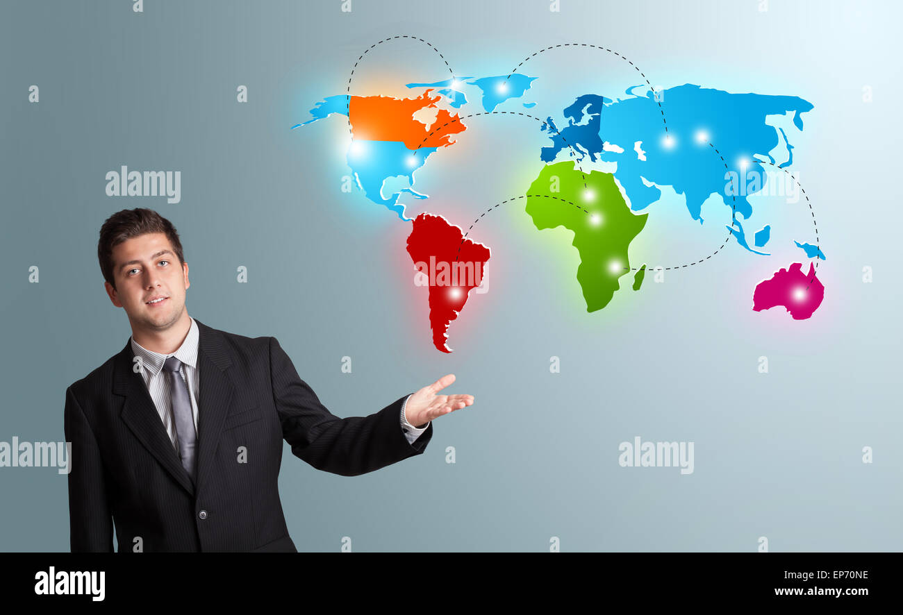 young man presenting colorful world map Stock Photo - Alamy