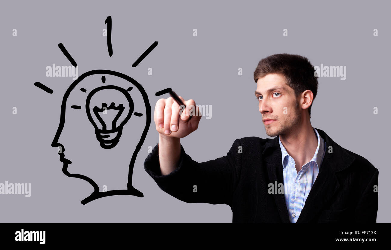 Businessman hand drawing and idea for making money Stock Photo - Alamy