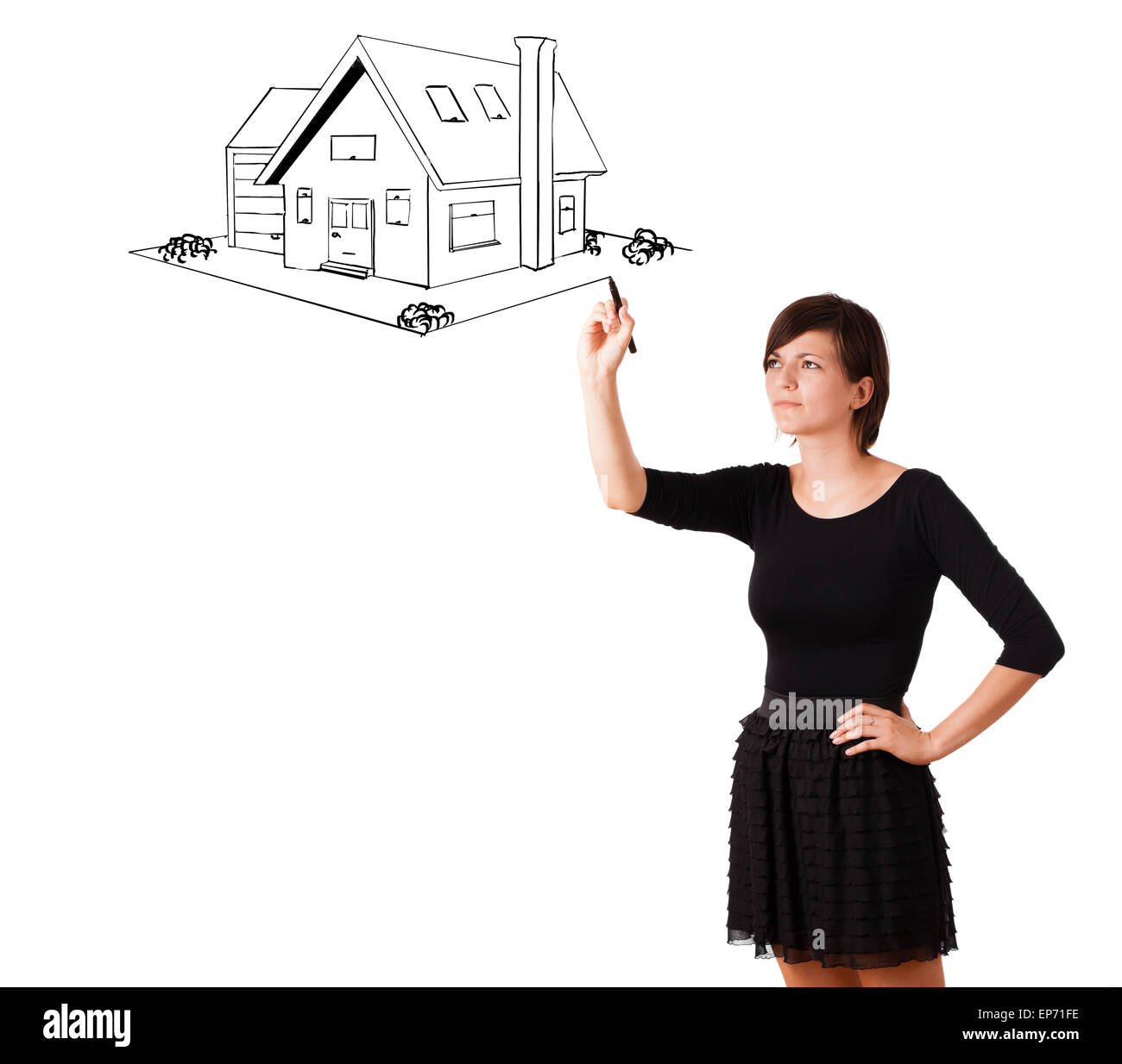 Young woman drawing a house on whiteboard Stock Photo - Alamy