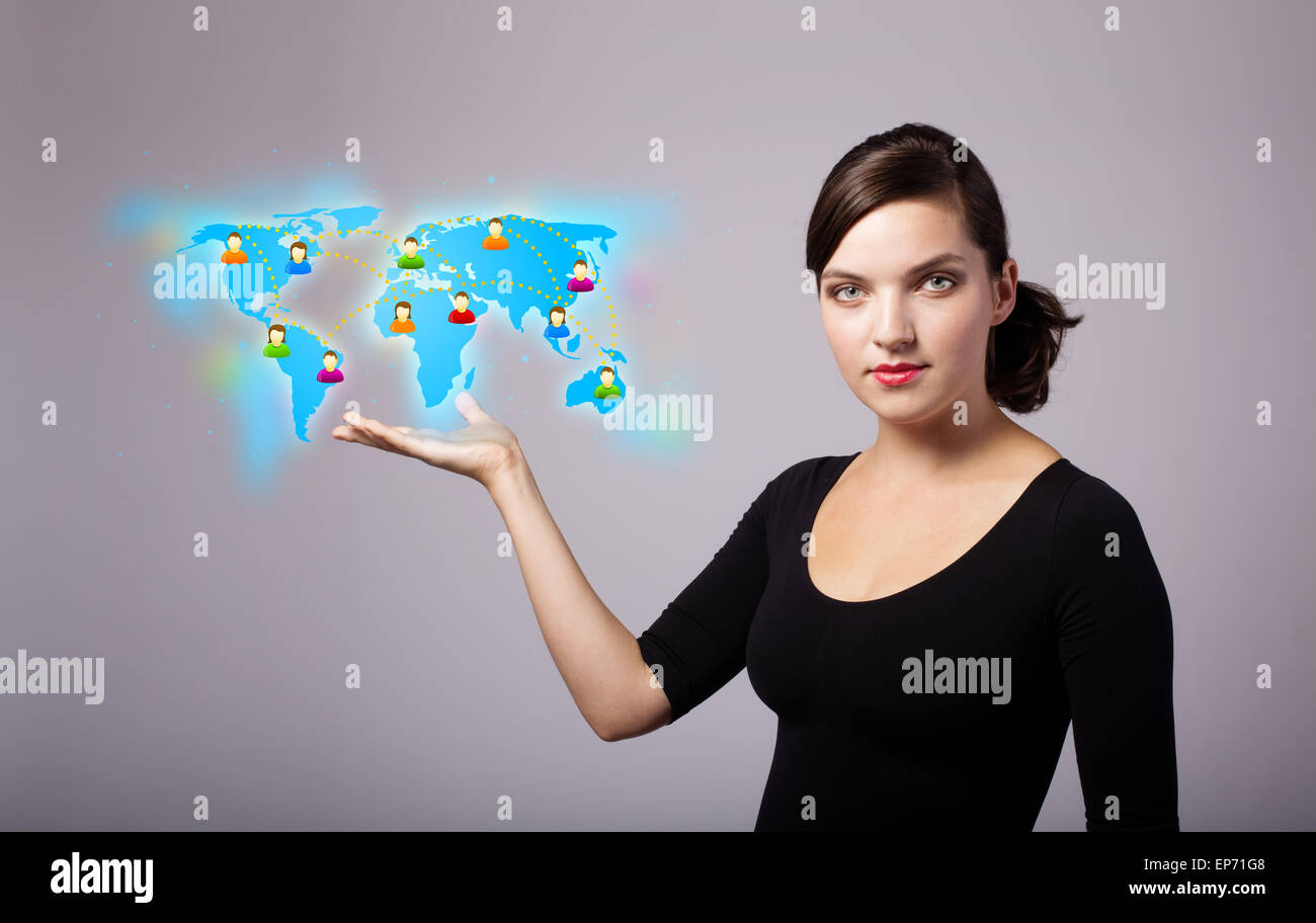 Young woman holding virtual map Stock Photo - Alamy