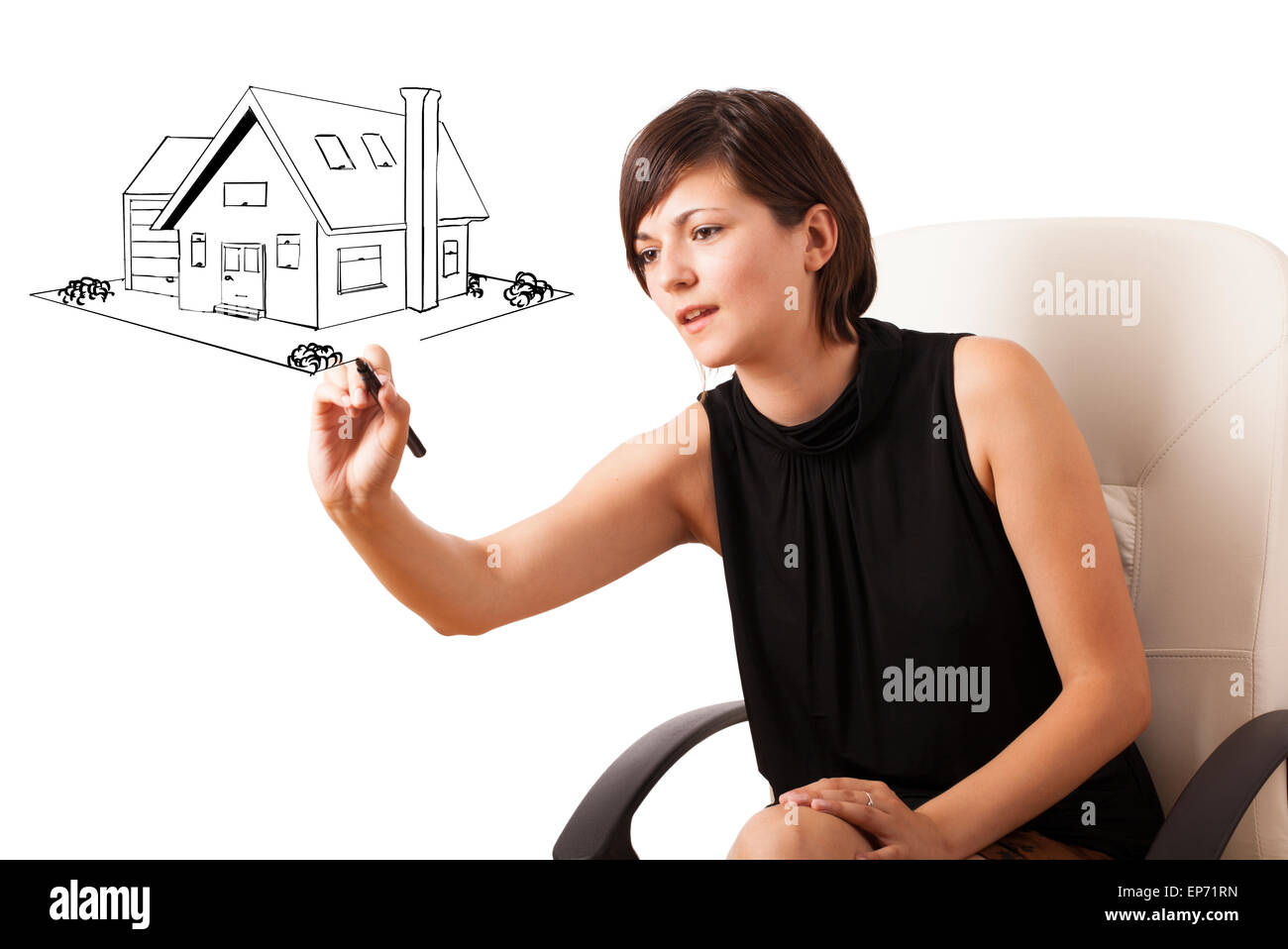 Young woman drawing a house on whiteboard Stock Photo - Alamy