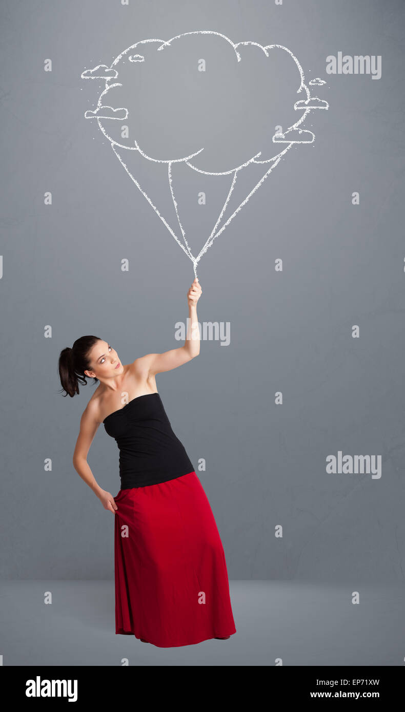 Pretty lady holding a cloud balloon drawing Stock Photo - Alamy