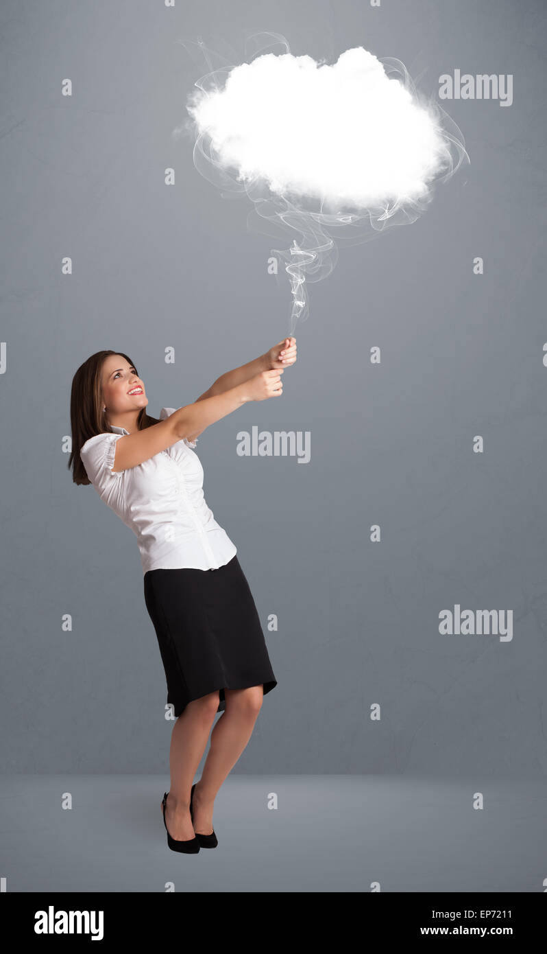 Beautiful lady holding cloud Stock Photo - Alamy