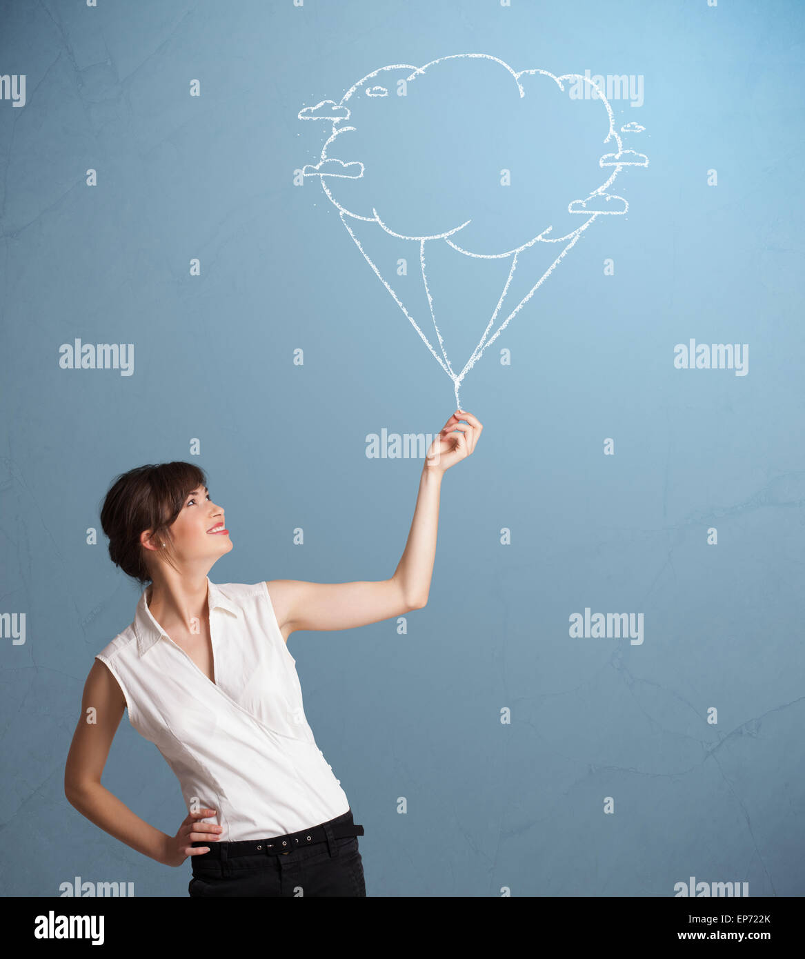 Pretty lady holding a cloud balloon drawing Stock Photo - Alamy