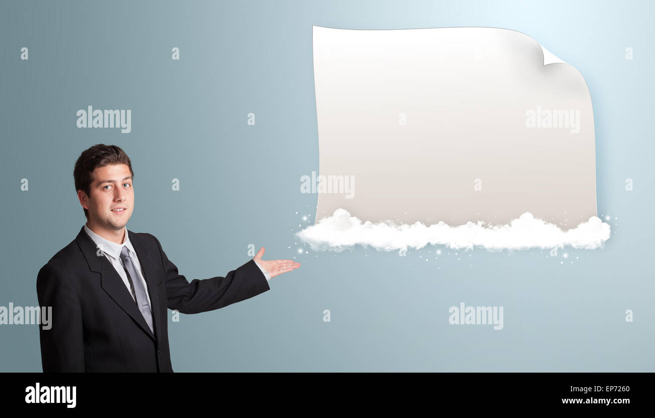 attractive man presenting modern copy space on clouds Stock Photo - Alamy