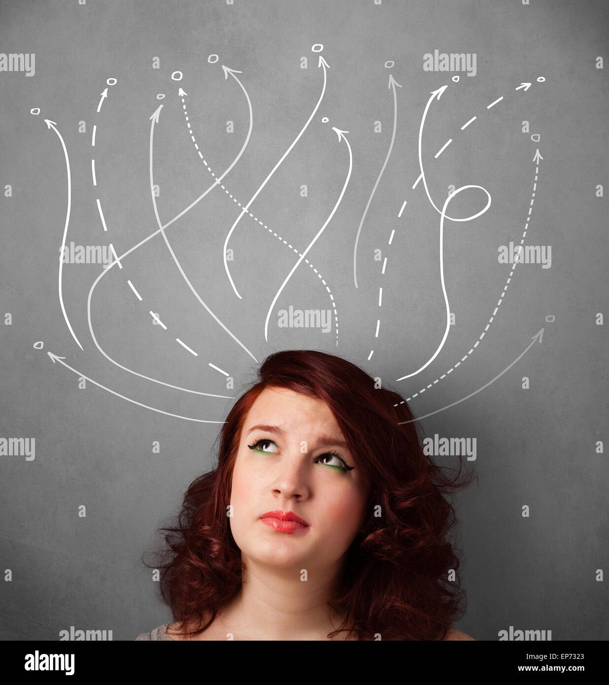 Young woman with arrows coming out of her head Stock Photo - Alamy