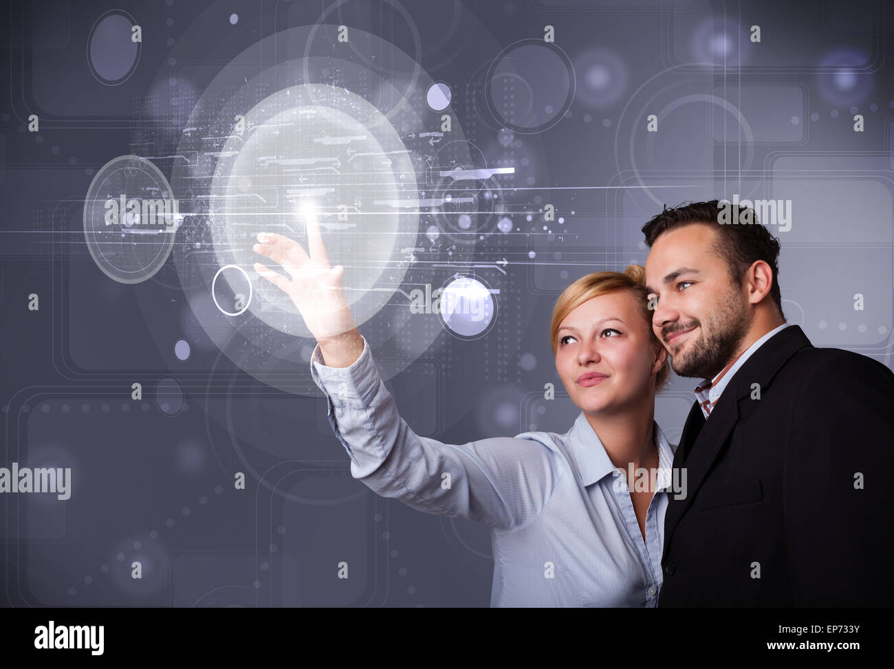 Couple press virtual screen button hi-res stock photography and images ...