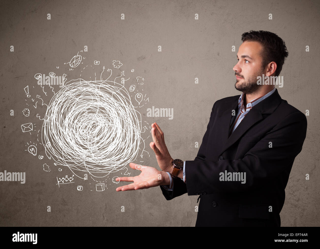 Chaos concept in the hand of a businessman Stock Photo - Alamy
