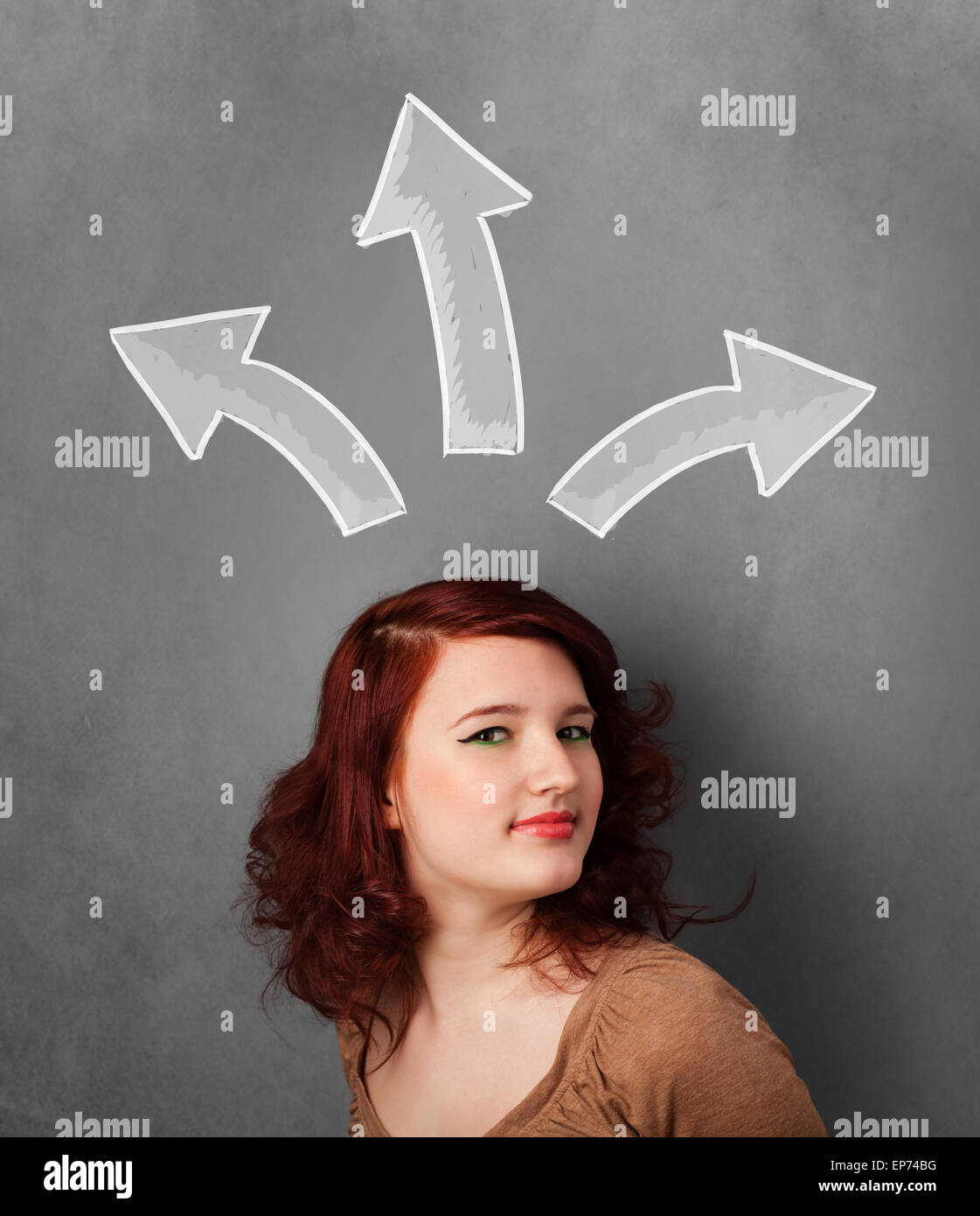 Young woman thinking with arrows above her head Stock Photo - Alamy
