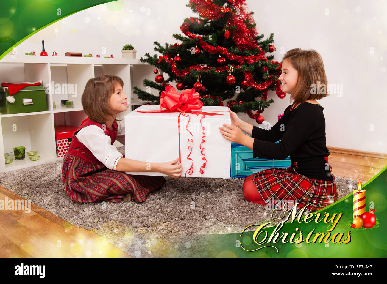 Kids with their christmas presents Stock Photo - Alamy