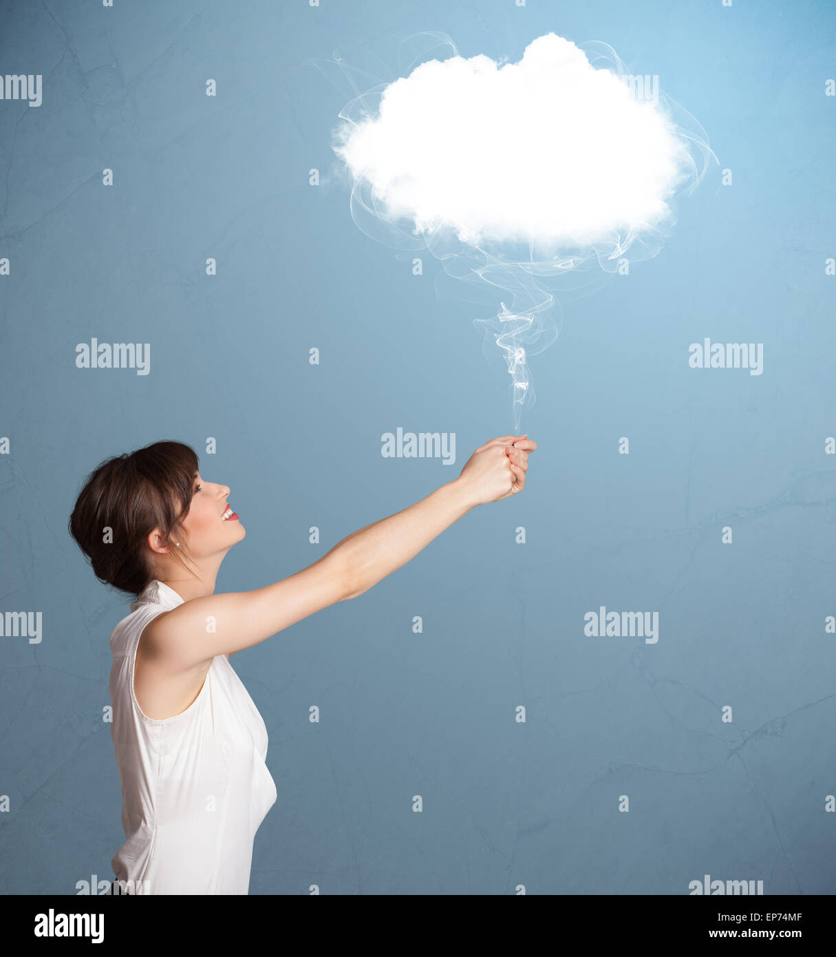 Beautiful lady holding cloud Stock Photo - Alamy