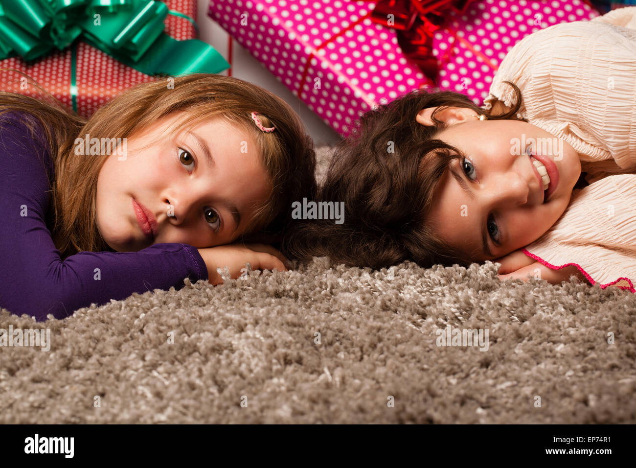 Happy kids with christmas present Stock Photo - Alamy
