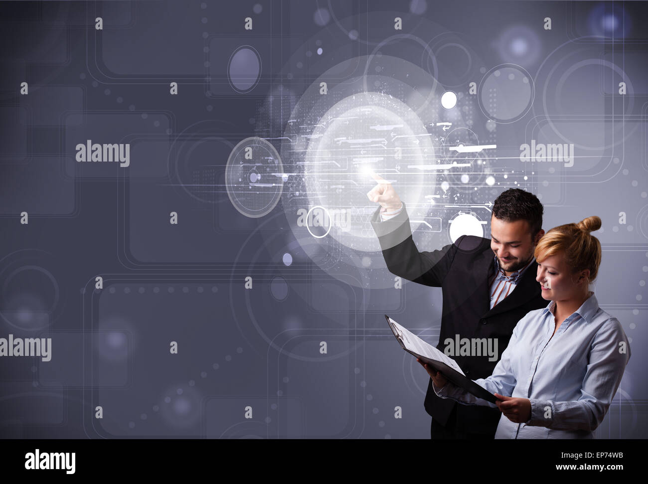 Happy couple touching abstract high technology circular buttons Stock ...