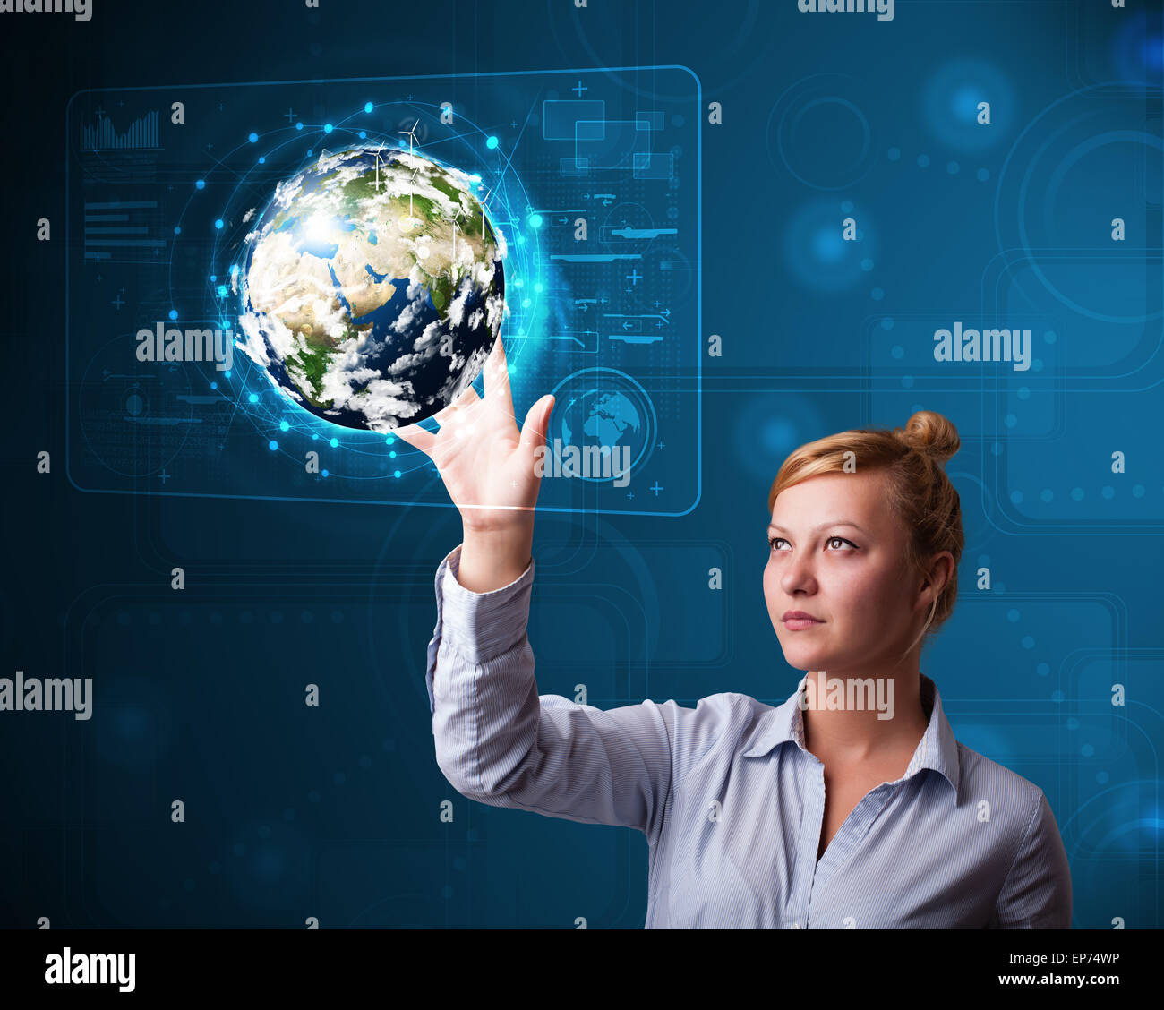 Young buinesswoman touching high-tech 3d earth panel Stock Photo - Alamy