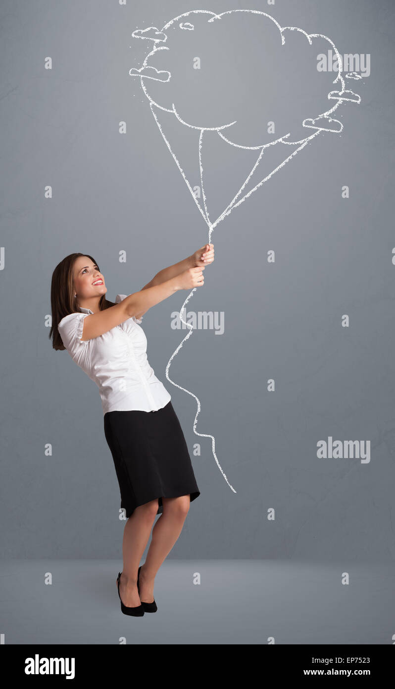 Pretty lady holding a cloud balloon drawing Stock Photo - Alamy