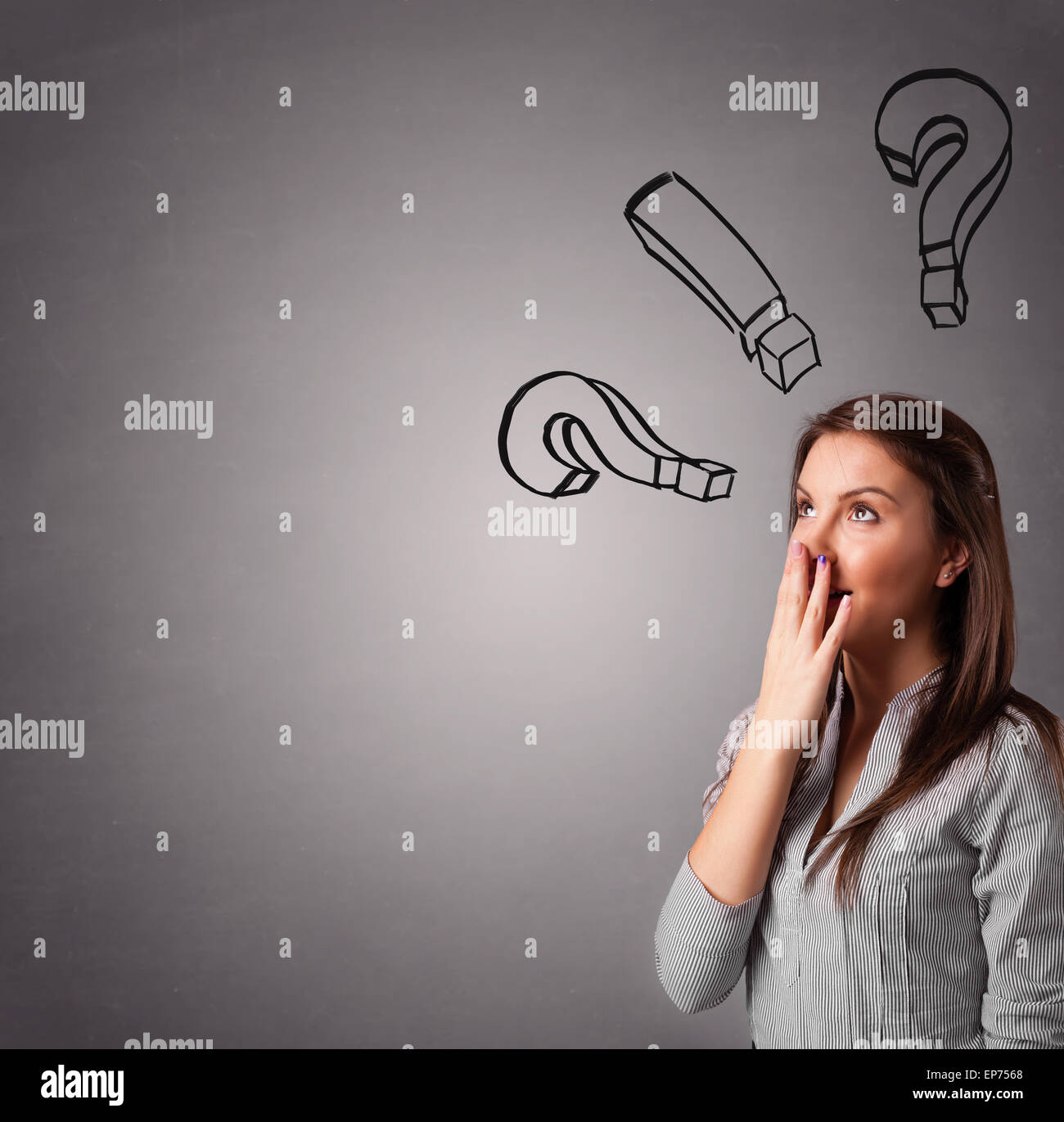 Young lady thinking with question marks overhead Stock Photo - Alamy