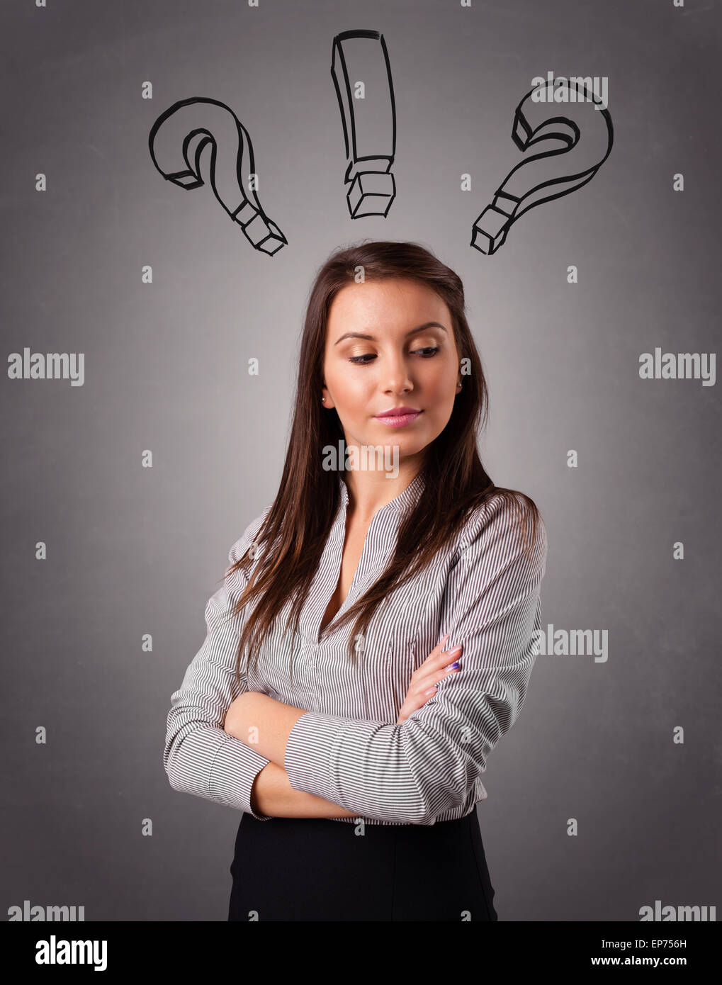 Young lady thinking with question marks overhead Stock Photo - Alamy