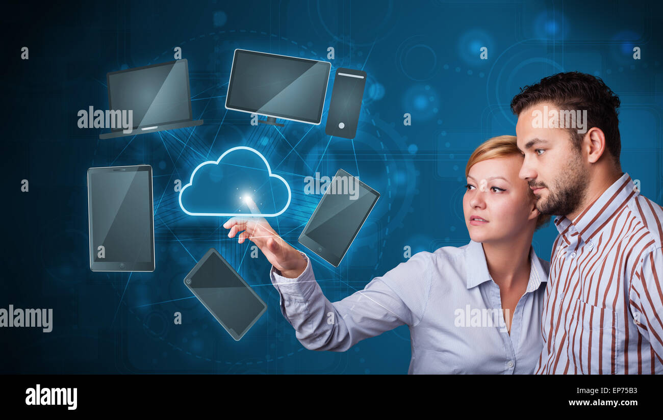 Happy couple touching cloud service Stock Photo - Alamy