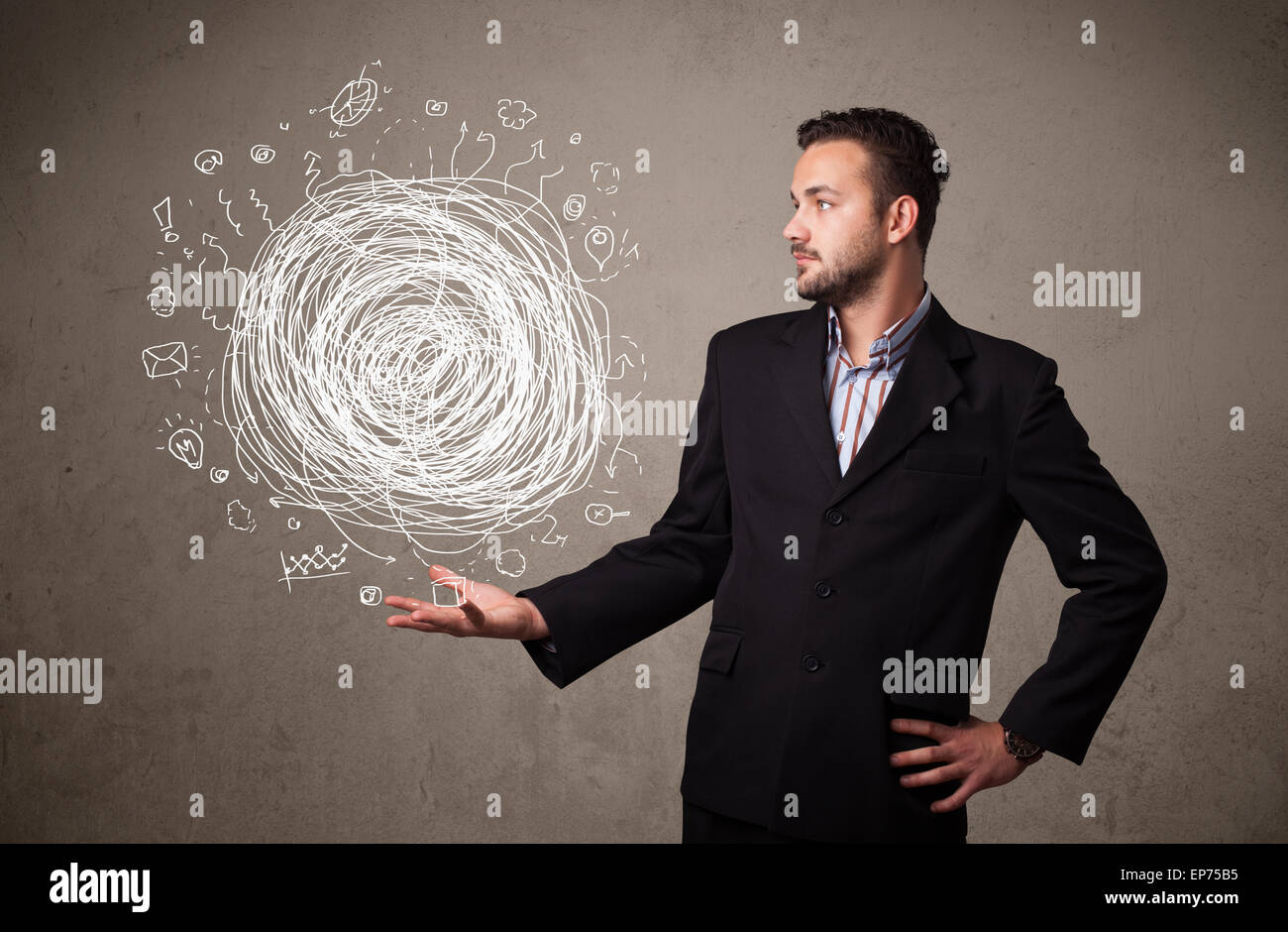 Chaos concept in the hand of a businessman Stock Photo - Alamy