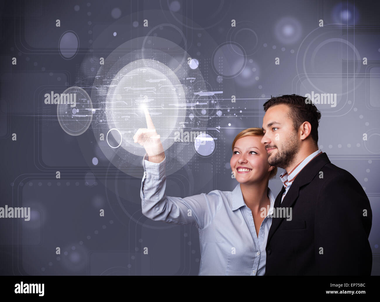 Couple press virtual screen button hi-res stock photography and images ...