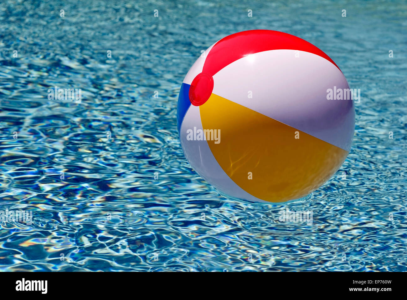 Colorful Beach Ball In Swimming Pool Stock Photo - Alamy