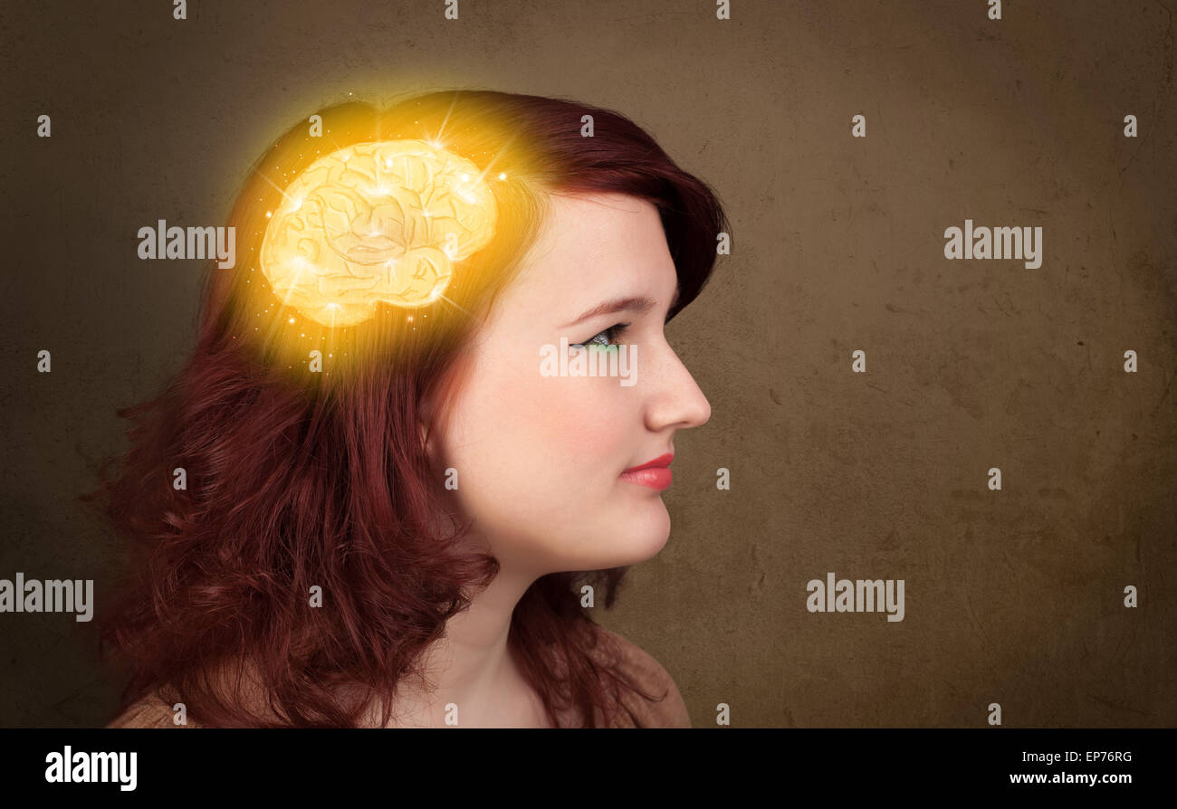 Young girl thinking with glowing brain illustration Stock Photo - Alamy