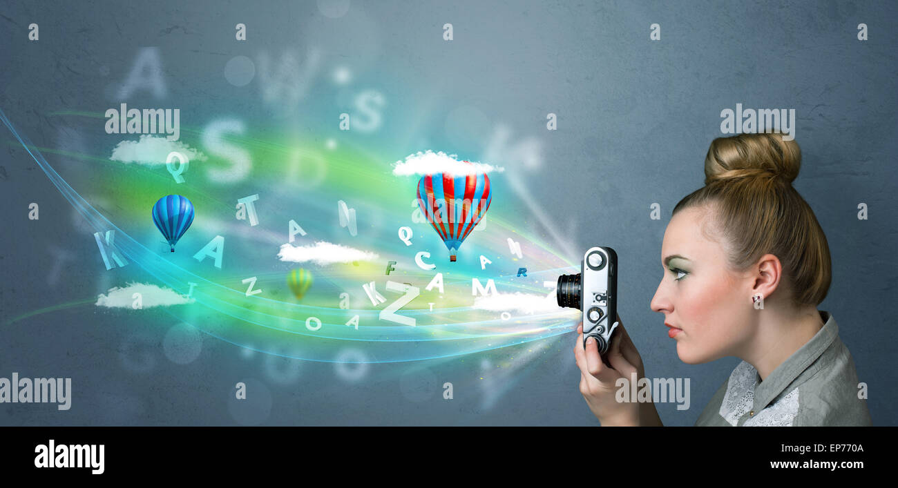 Photographer with camera and abstract imaginary Stock Photo - Alamy
