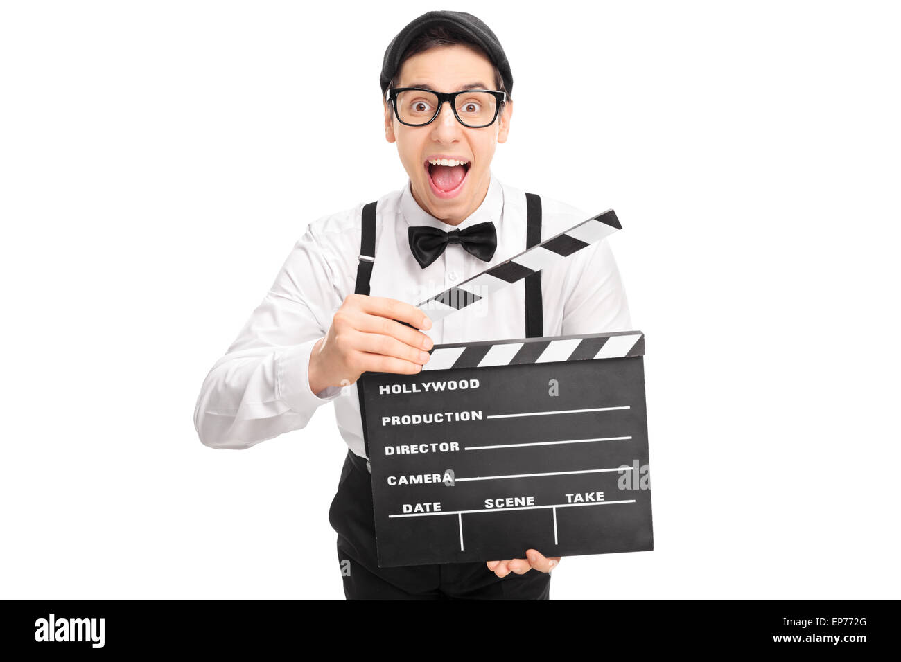 Excited movie director with glasses holding a movie clapperboard and ...