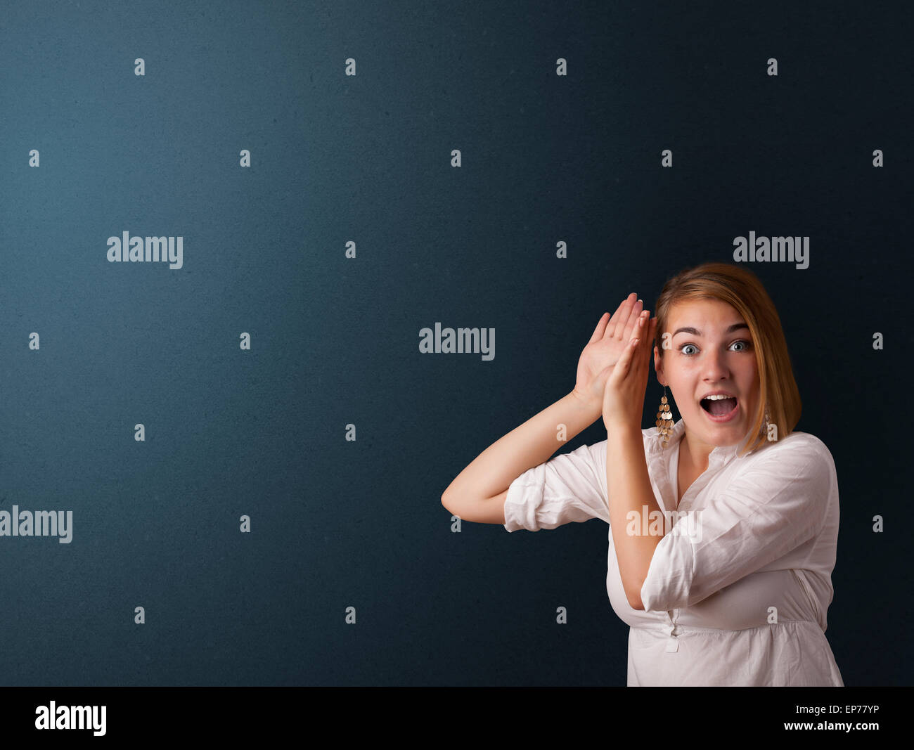Young woman making gestures Stock Photo - Alamy