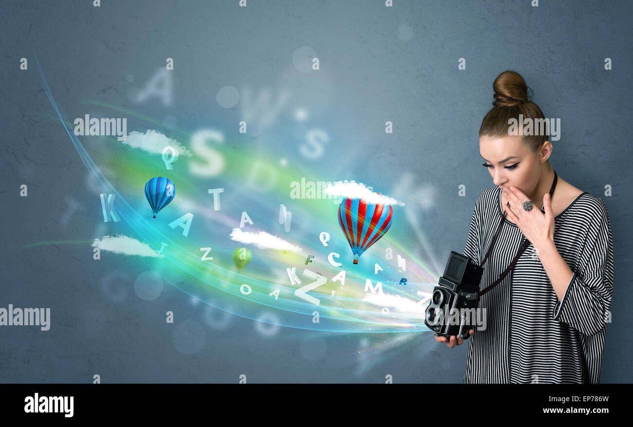 Photographer with camera and abstract imaginary Stock Photo - Alamy