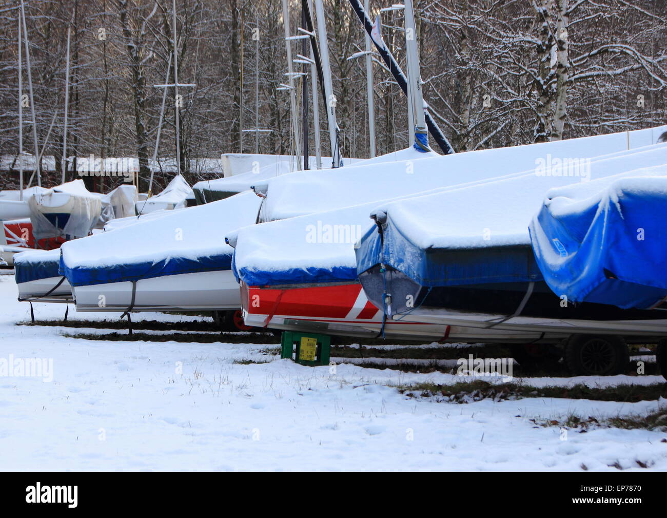Perspective of sailing ships on shore with snow Stock Photo - Alamy