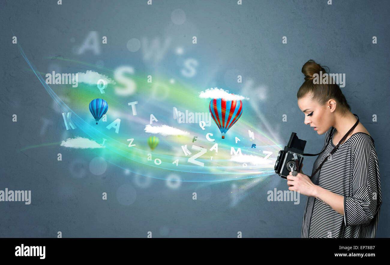 Photographer with camera and abstract imaginary Stock Photo - Alamy