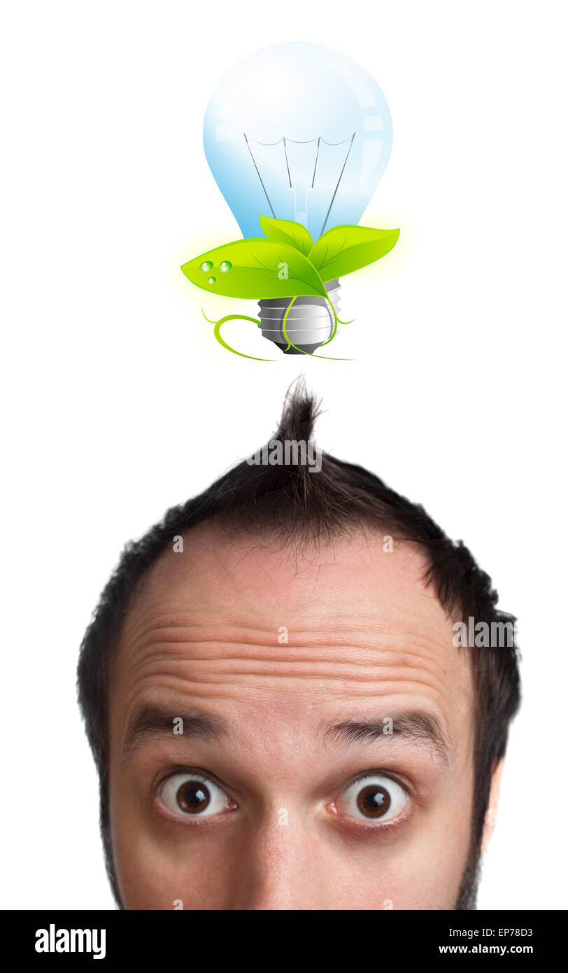 Funny young man with light bulb over his head Stock Photo - Alamy