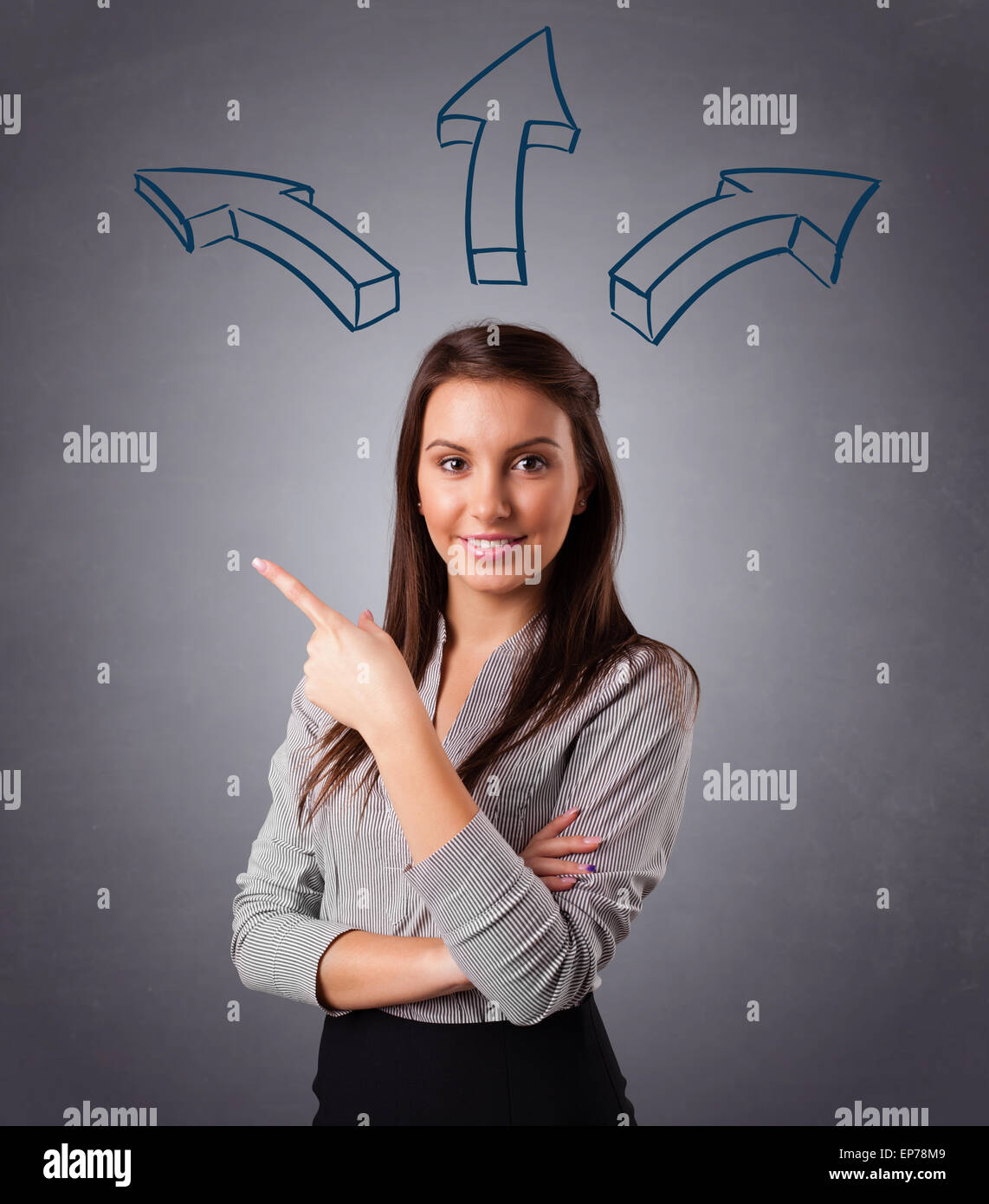 Pretty lady thinking with arrows overhead Stock Photo - Alamy