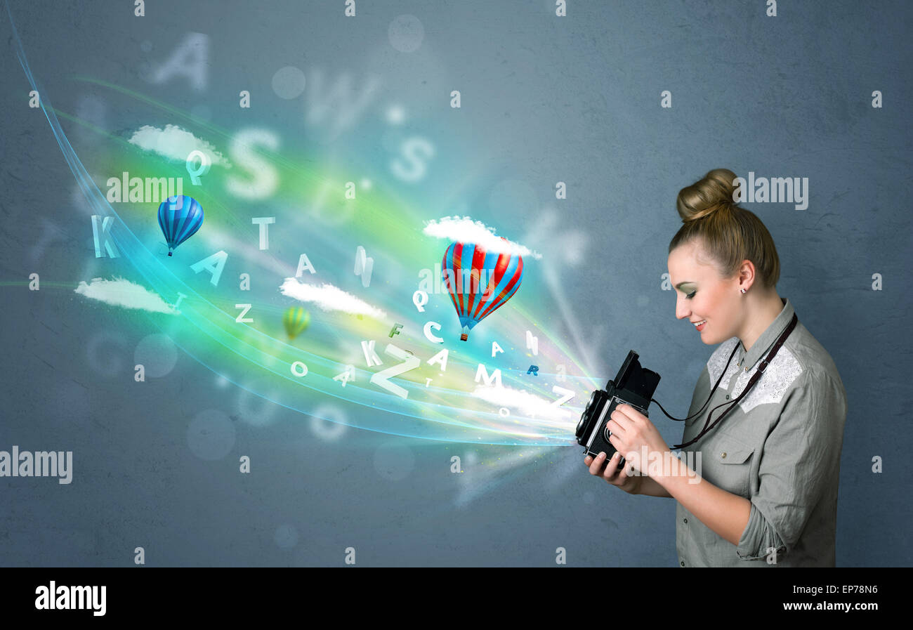 Photographer with camera and abstract imaginary Stock Photo - Alamy